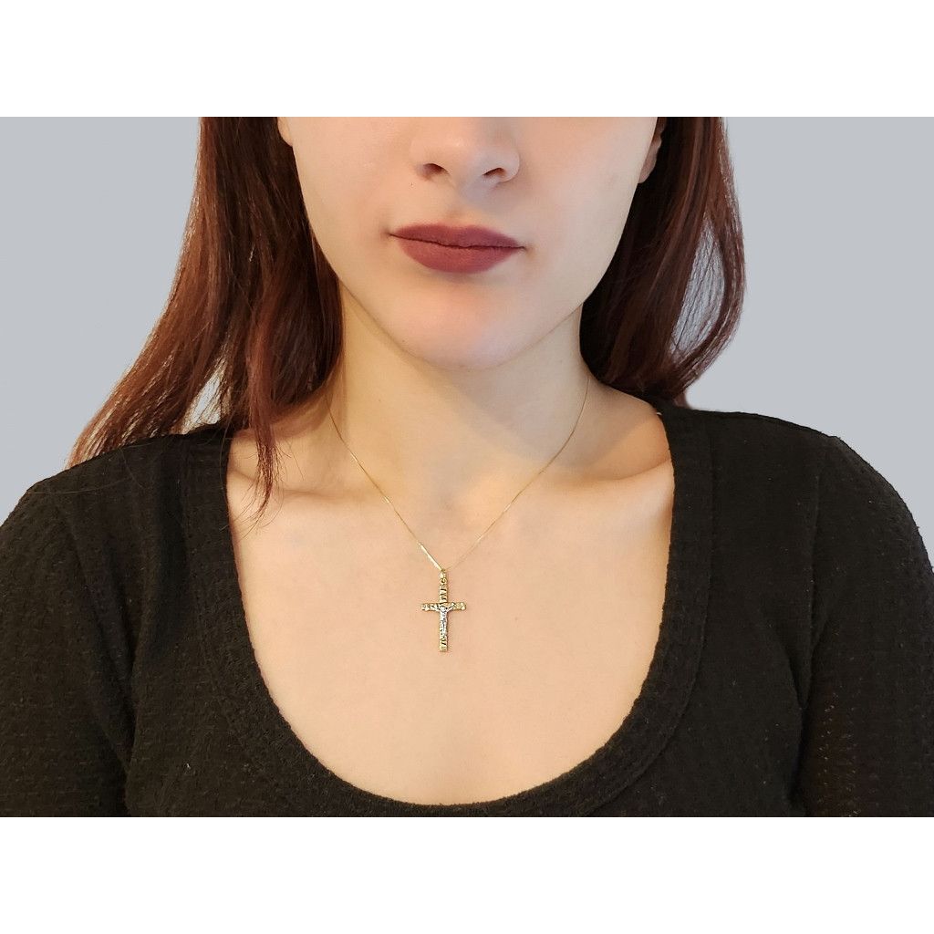 Cross with Irregular Reliefs in Yellow Gold with Christ in White