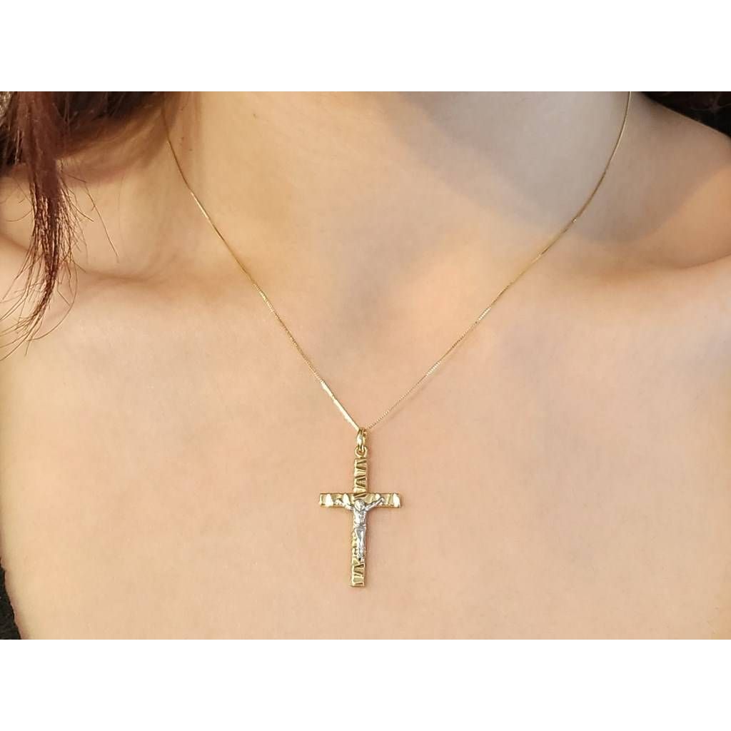 Cross with Irregular Reliefs in Yellow Gold with Christ in White
