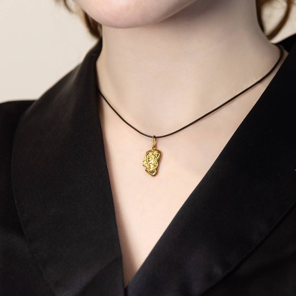 Madonna face pendant