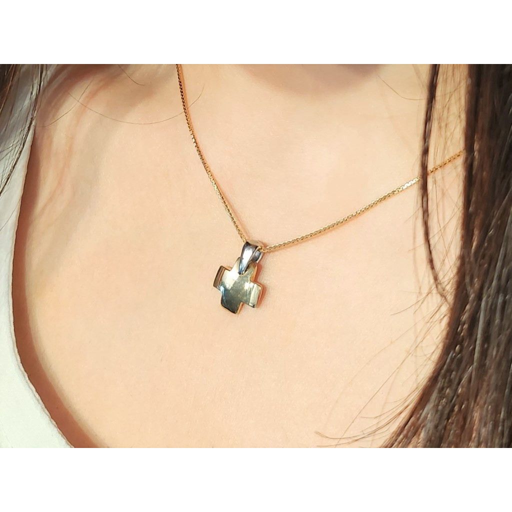 yellow gold short cross with white gold attachment