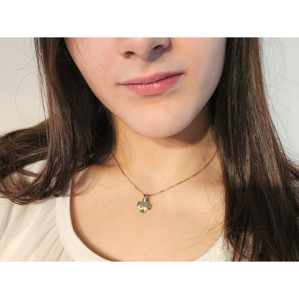 yellow gold short cross with white gold attachment